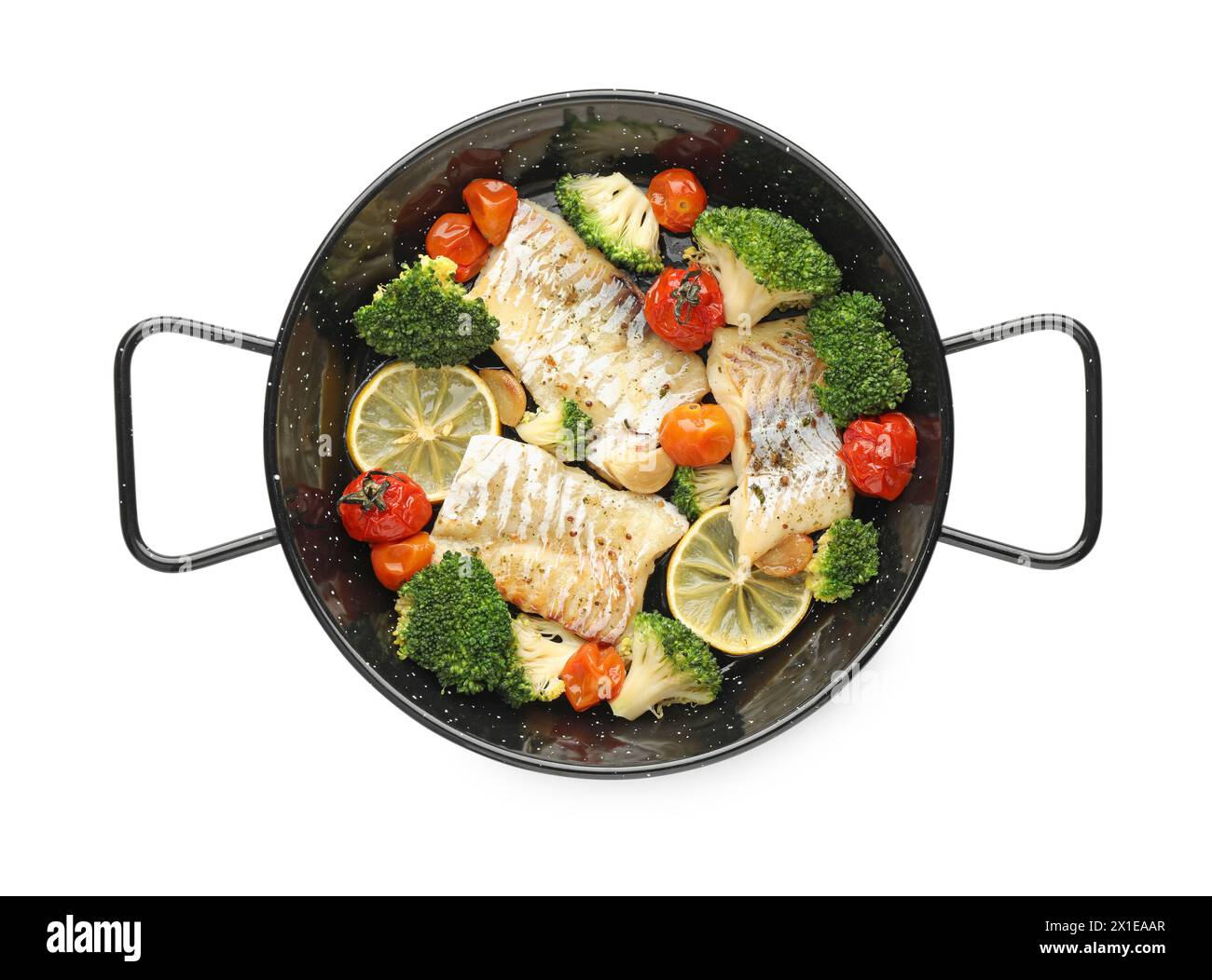 Tasty cod cooked with vegetables in frying pan isolated on white, top ...
