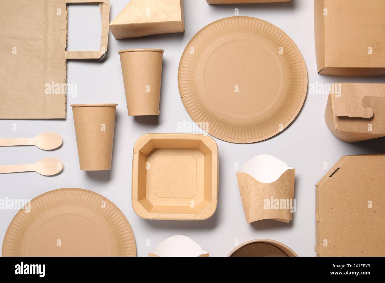 Flat lay composition with eco friendly food packagings on light grey ...