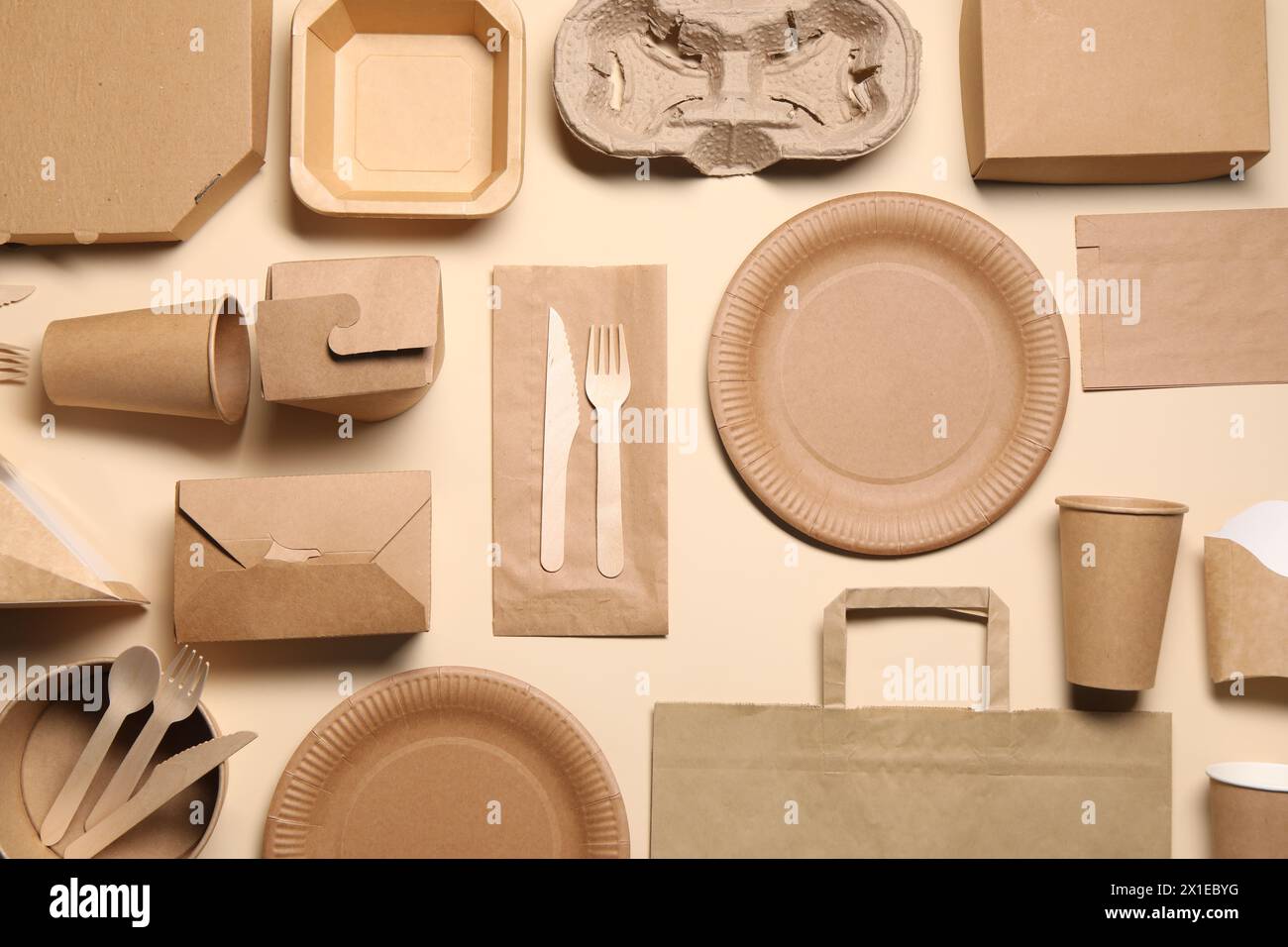 Flat lay composition with eco friendly food packagings on beige ...