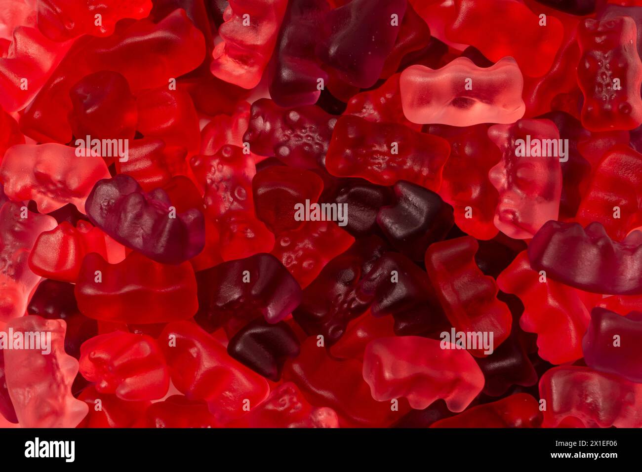 Assorted red gummy candies. Top view. Jelly bears Stock Photo - Alamy