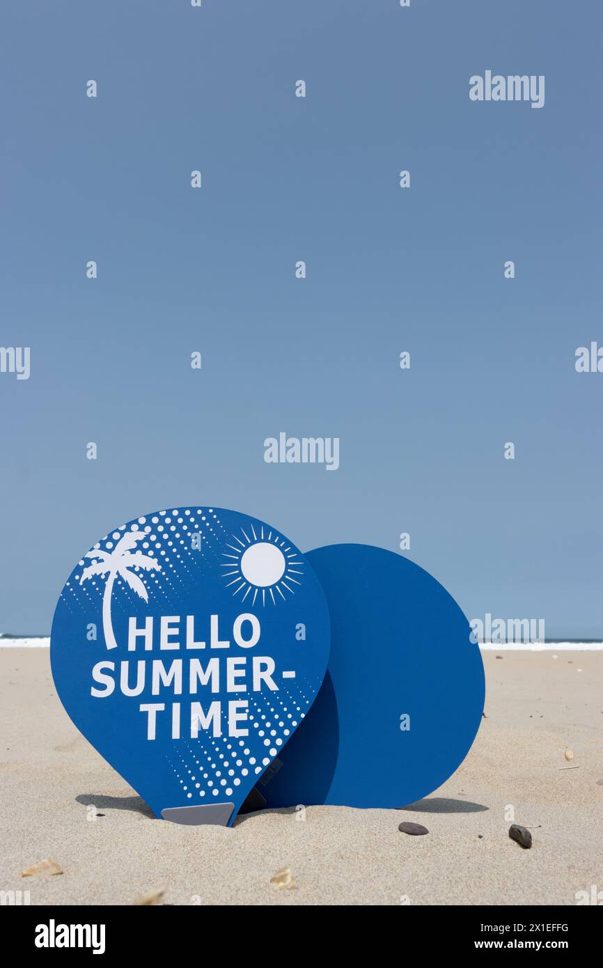 Some beach rackets placed in the sand of a beach Stock Photo - Alamy