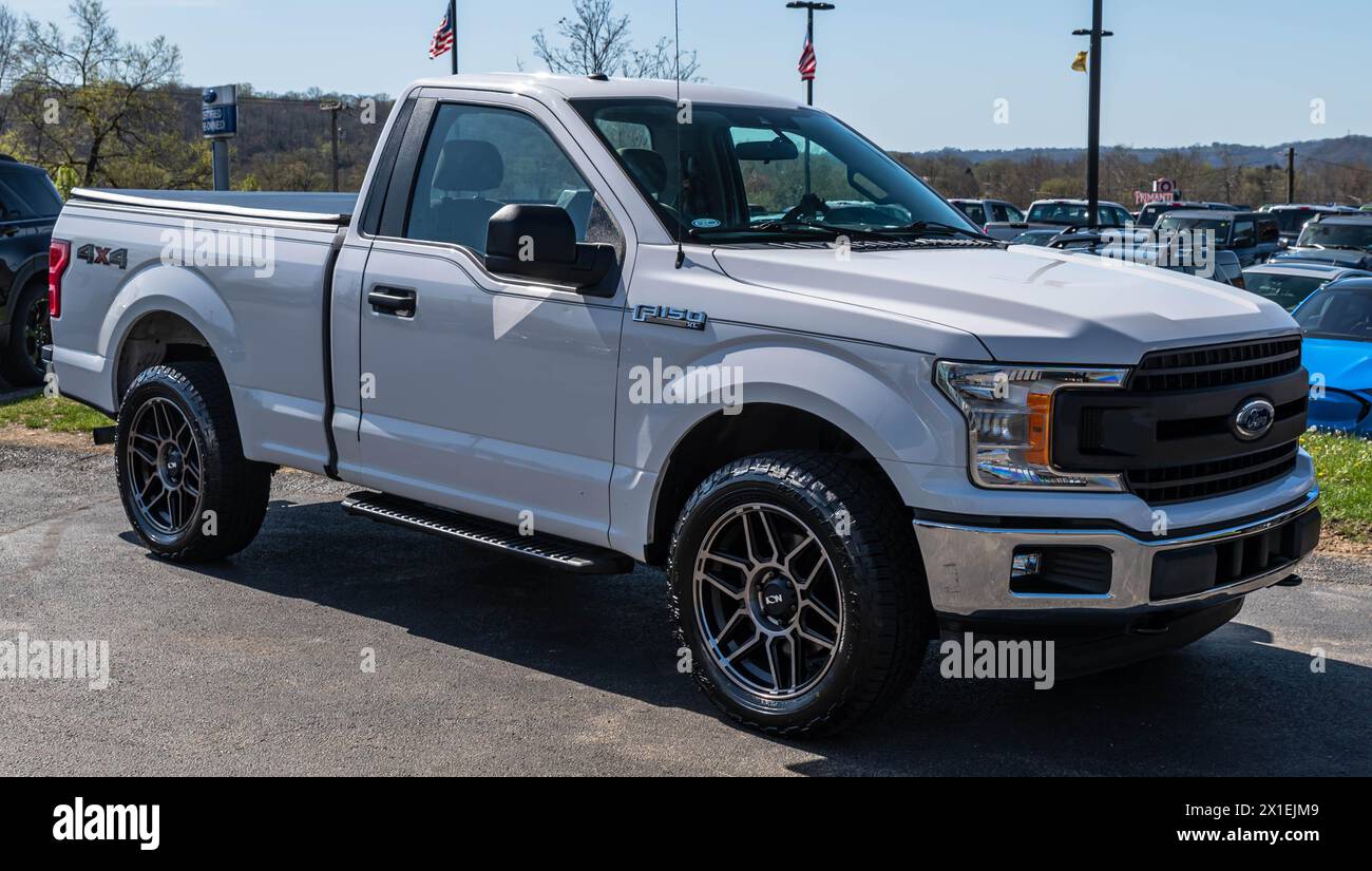 A Ford F150 two door pickup truck for sale at a dealership Stock Photo ...