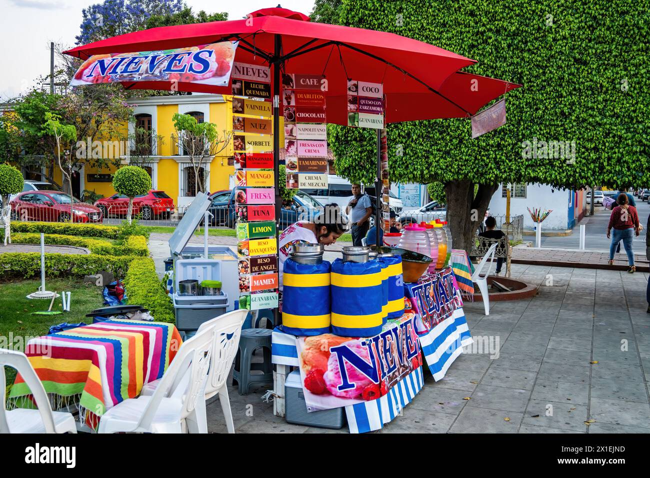 A woman selling cold drinks at the town center of small town Santa ...