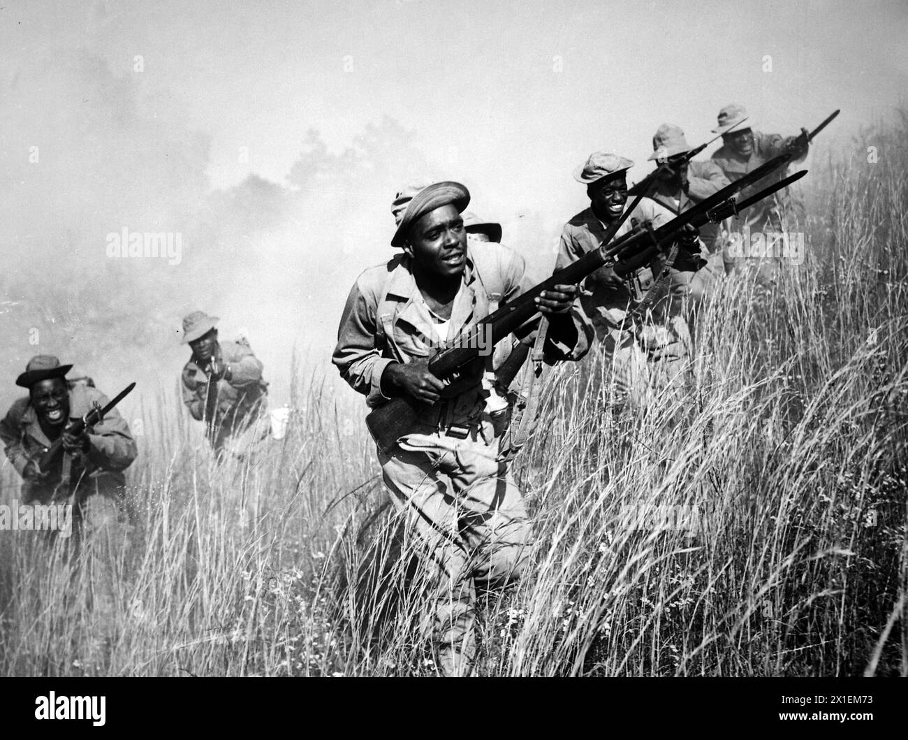 A squad of non-coms, cadres of the 92nd Division, get a refresher ...