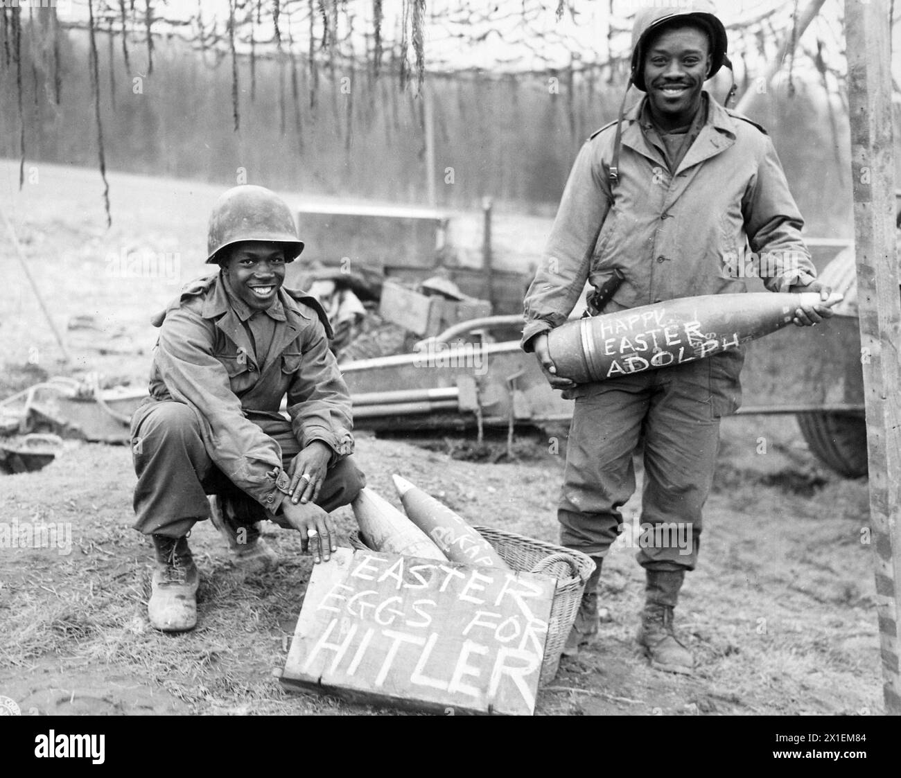 Original caption: Easter morning, T/5 William E. Thomas...and Pfc ...