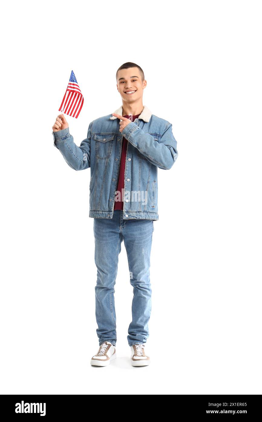 Teenage boy pointing at USA flag on white background Stock Photo - Alamy