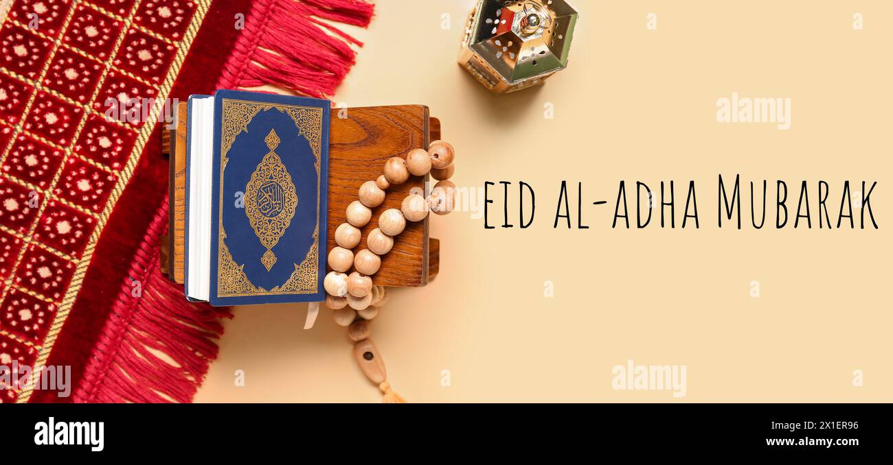 Koran, prayer beads, mat and text EID AL ADHA MUBARAK (Blessed Eid Al ...