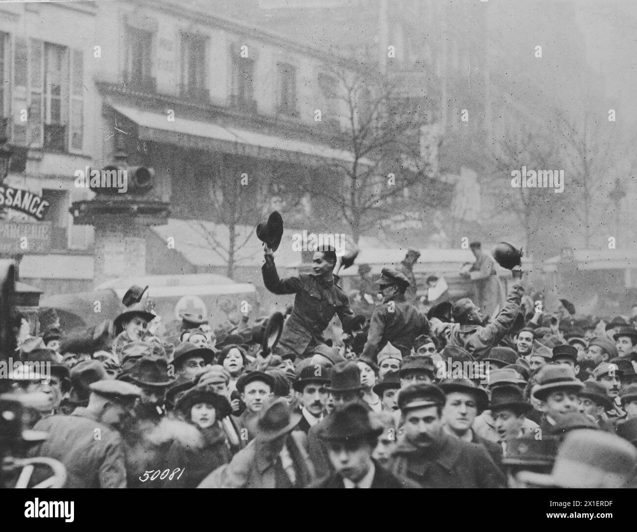 Crowds in the street celebrating the Armistice in France ca. November ...