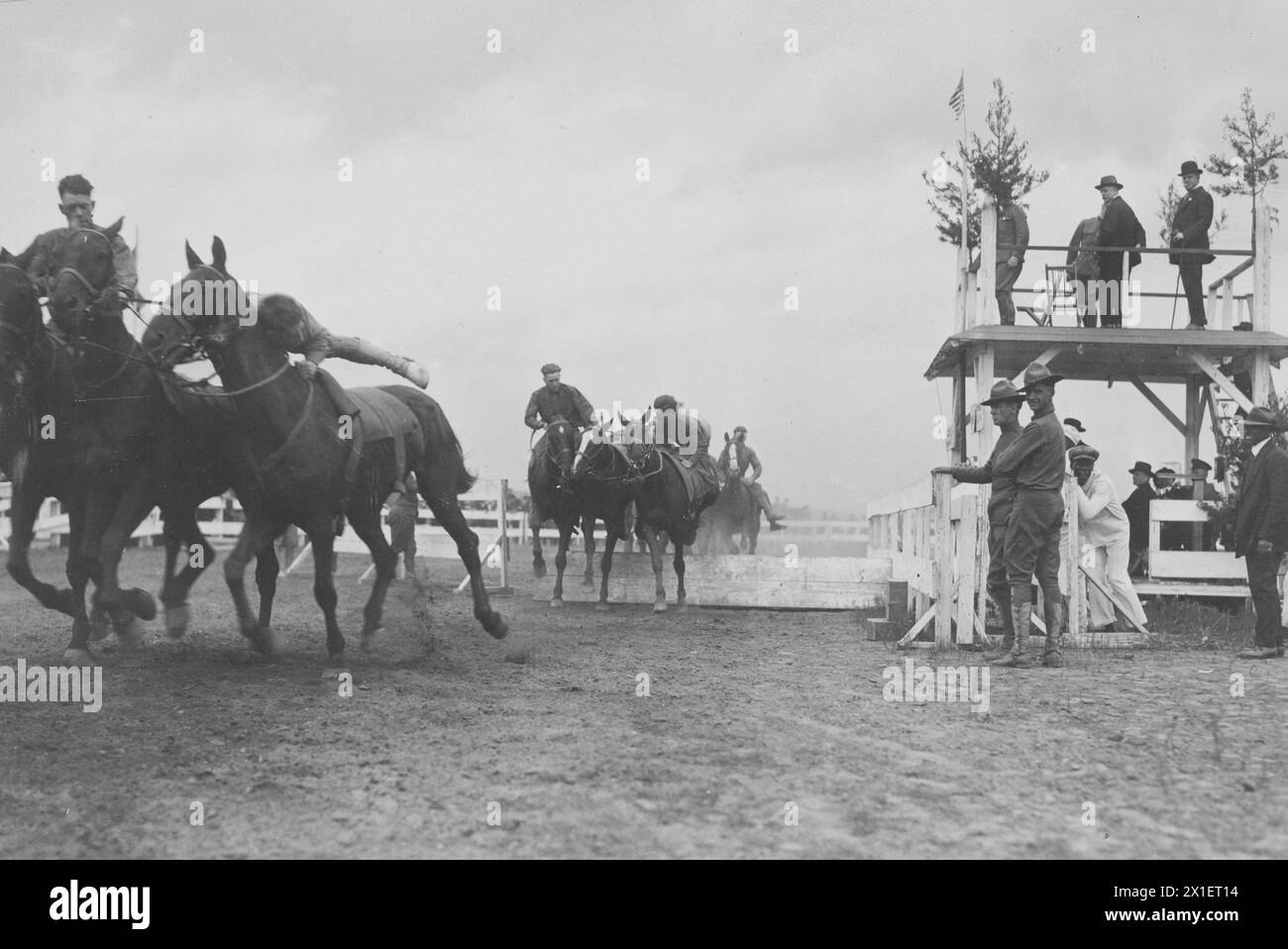 Hurdle jumping and monkey drill by members of 11th Cavalry at Arlington ...