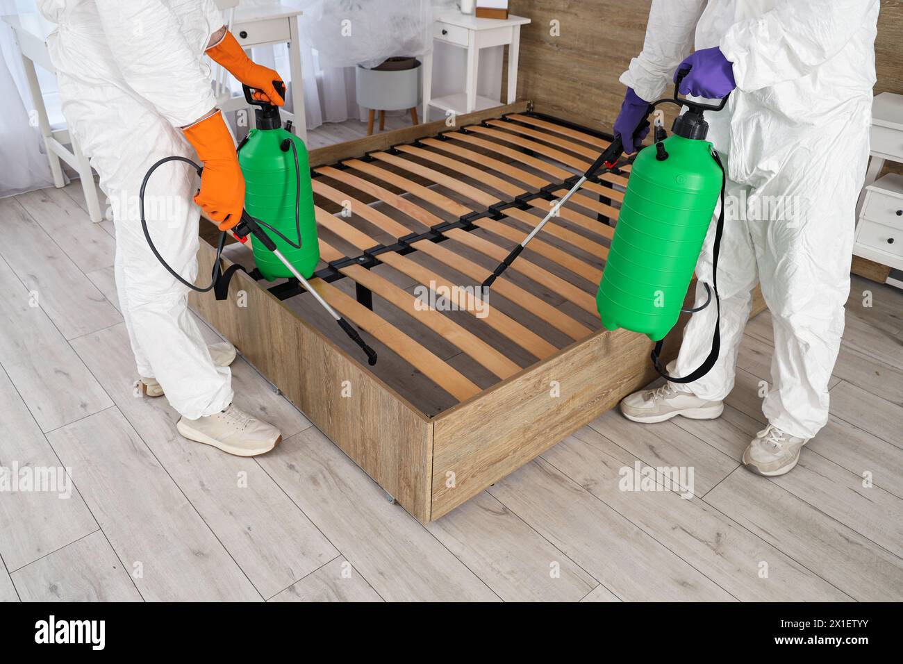 Disinfectant workers in hazmat suits use hi-res stock photography and ...