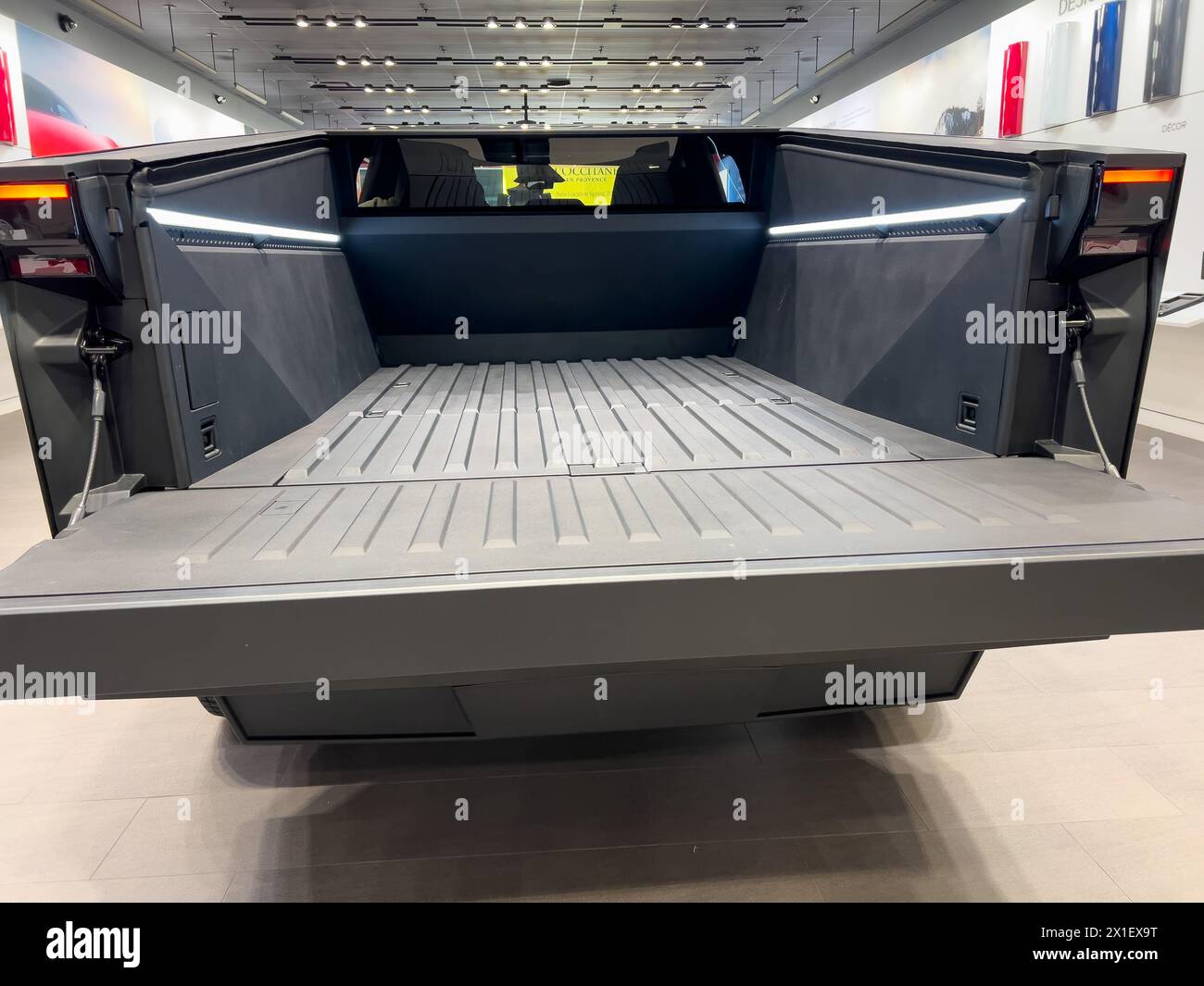 Exploring Tesla Cybertruck Tailgate Features in Showroom Stock Photo ...