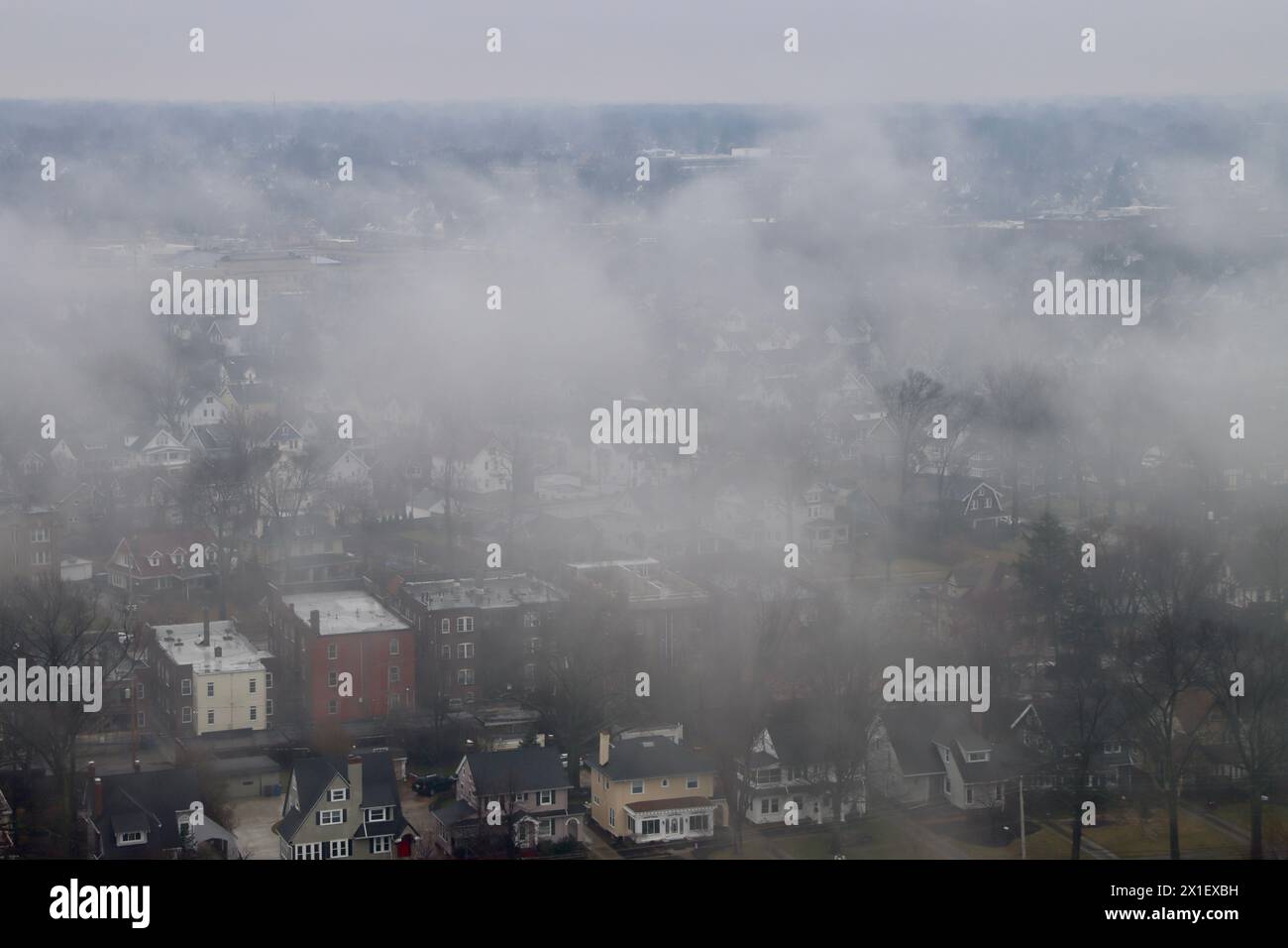 Thick fog over houses in hi-res stock photography and images - Alamy