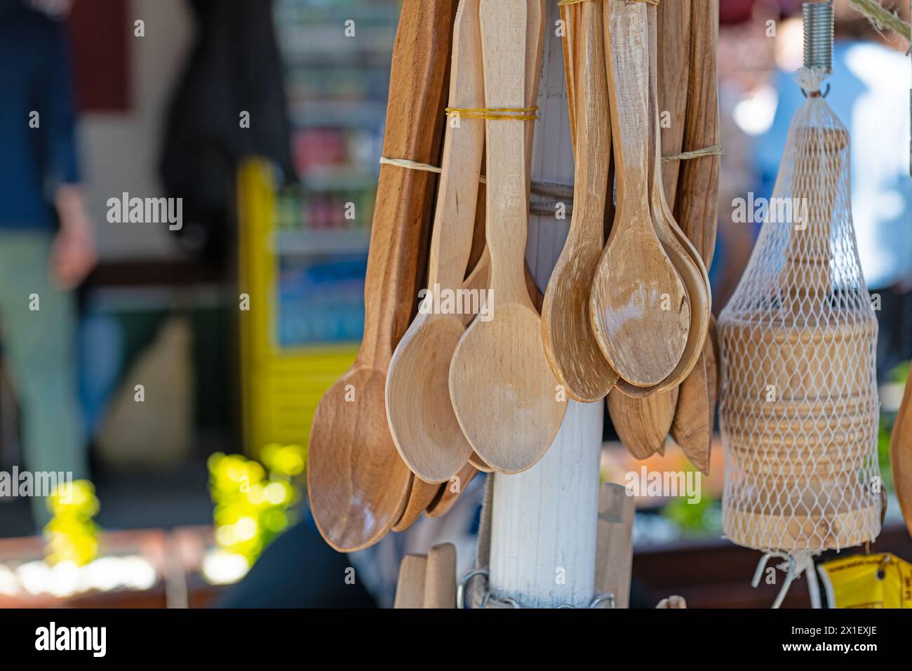Handmade wooden spoons on a street vendor's stall Stock Photo - Alamy