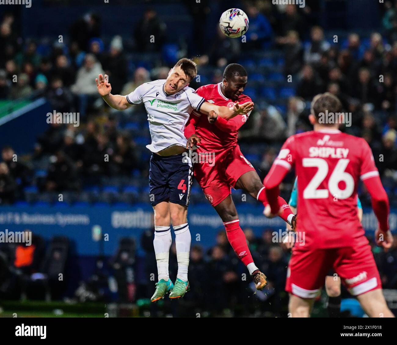 George Thomason of Bolton Wanderers and Daniel Udoh of Shrewsbury Town ...