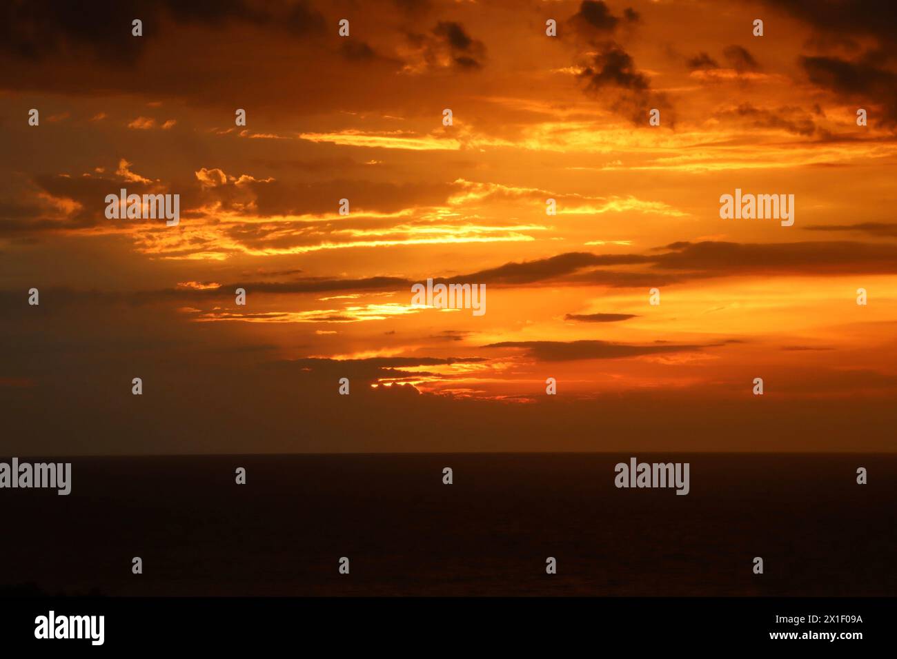 Sun setting through storm clouds on Lake Erie in Northeast Ohio, USA ...