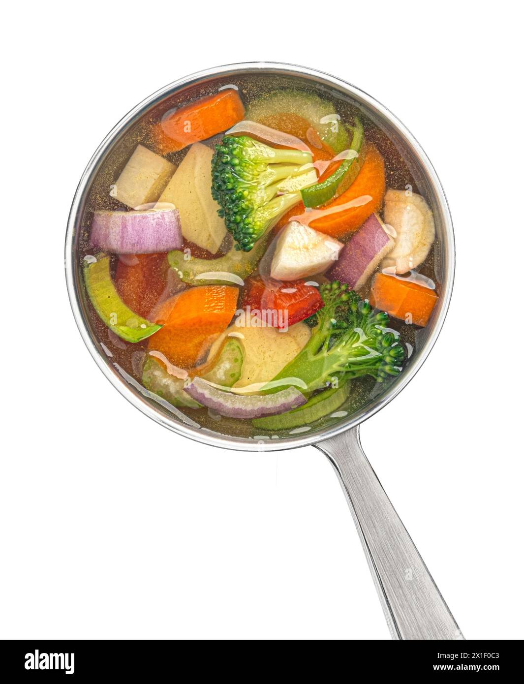 Ladle with vegetable soup isolated on white background with clipping ...