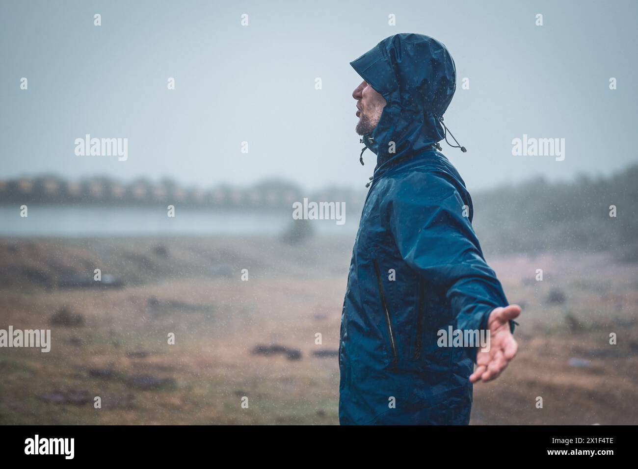 Description: Side view of an excited and healthy male tourist with ...