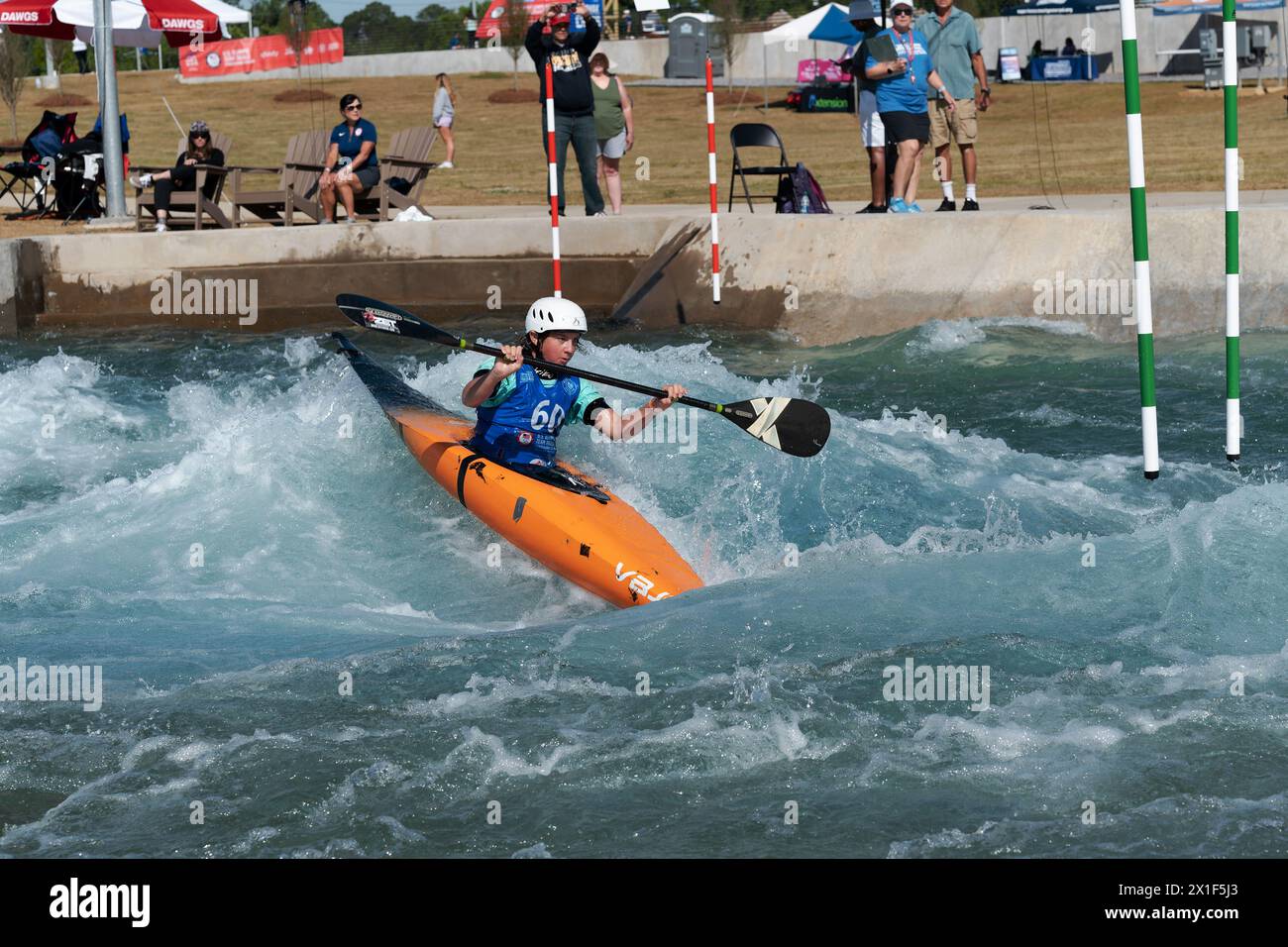Young boy, Isaac Long a competitor competes during the 2024 Kayak ...