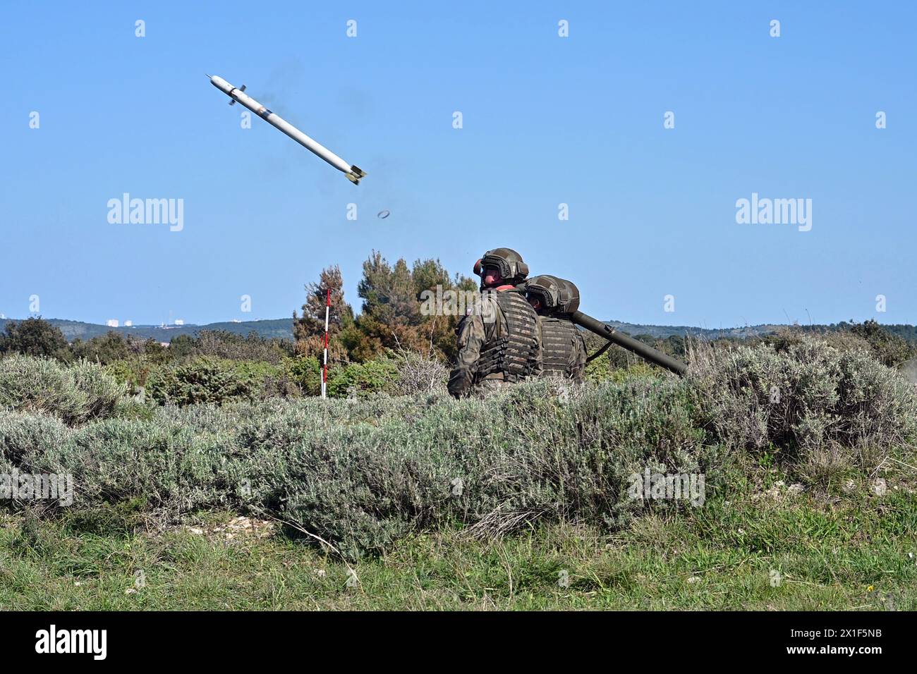 Polish Army soldiers, fire a man-portable air-defense system (MANPADS ...