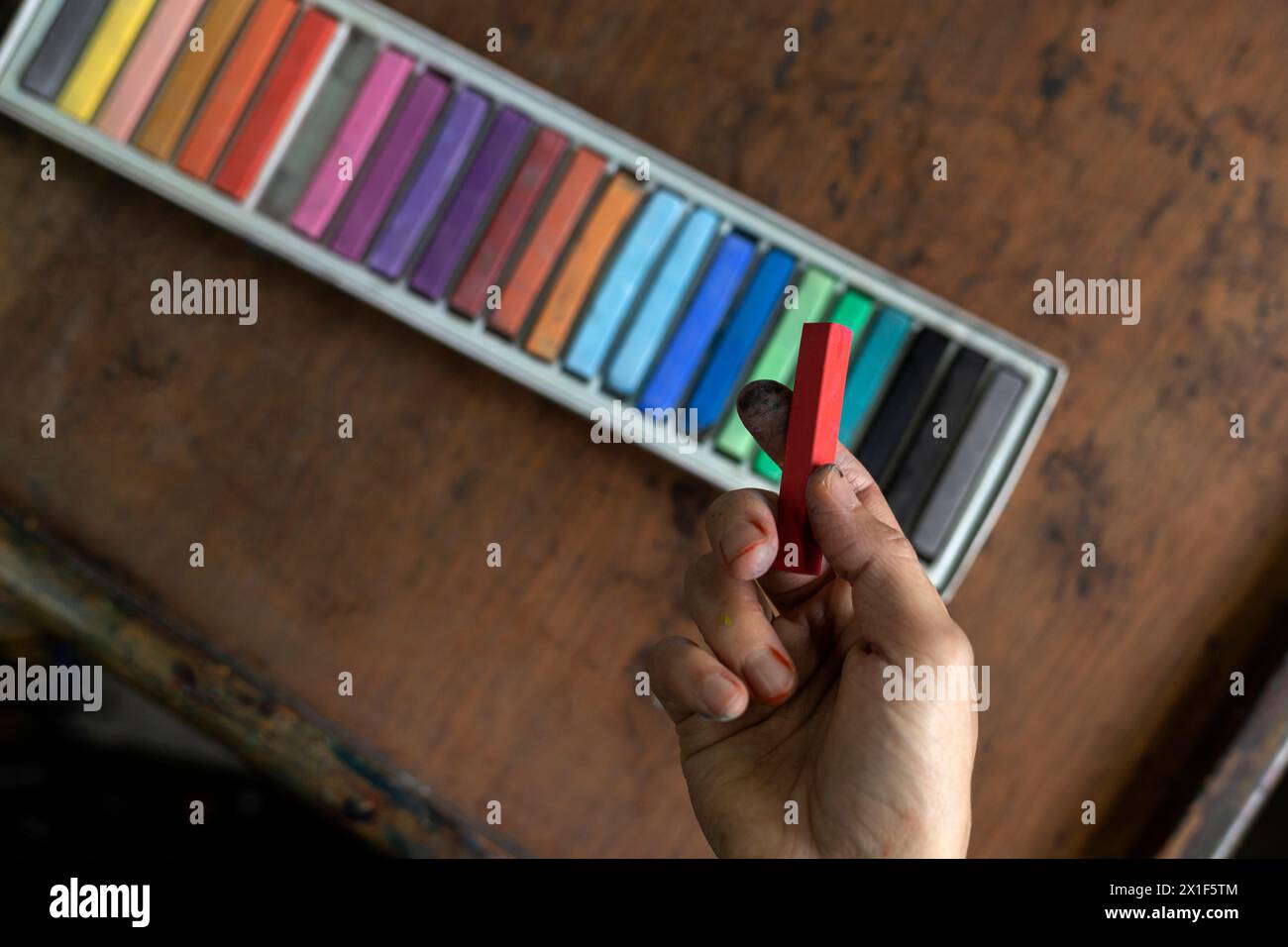 Close-up of colored chalk used in art studio, unrecognizable Latin ...