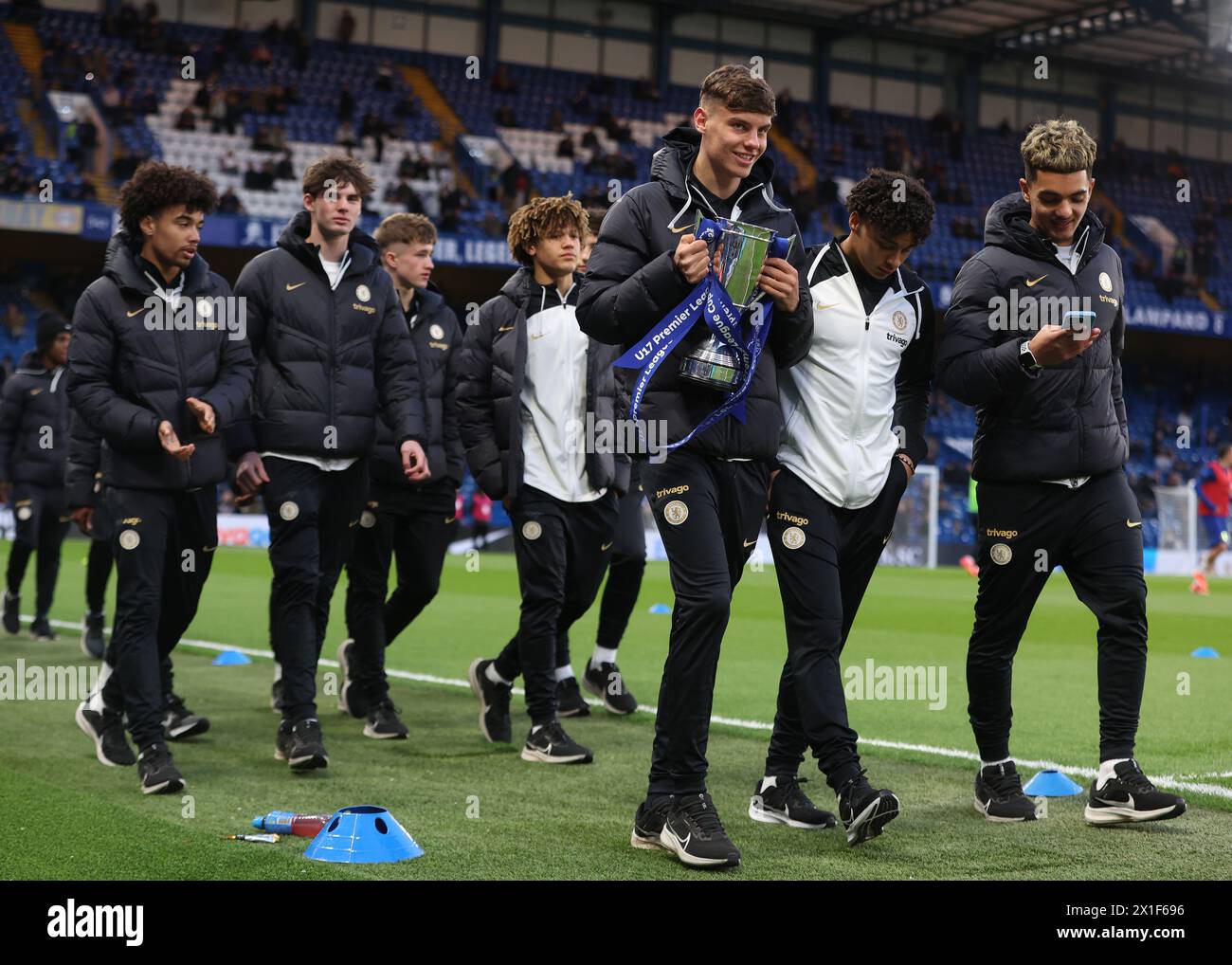 London, UK. 15th Apr, 2024. The Chelsea U17 team celebrate by walking ...
