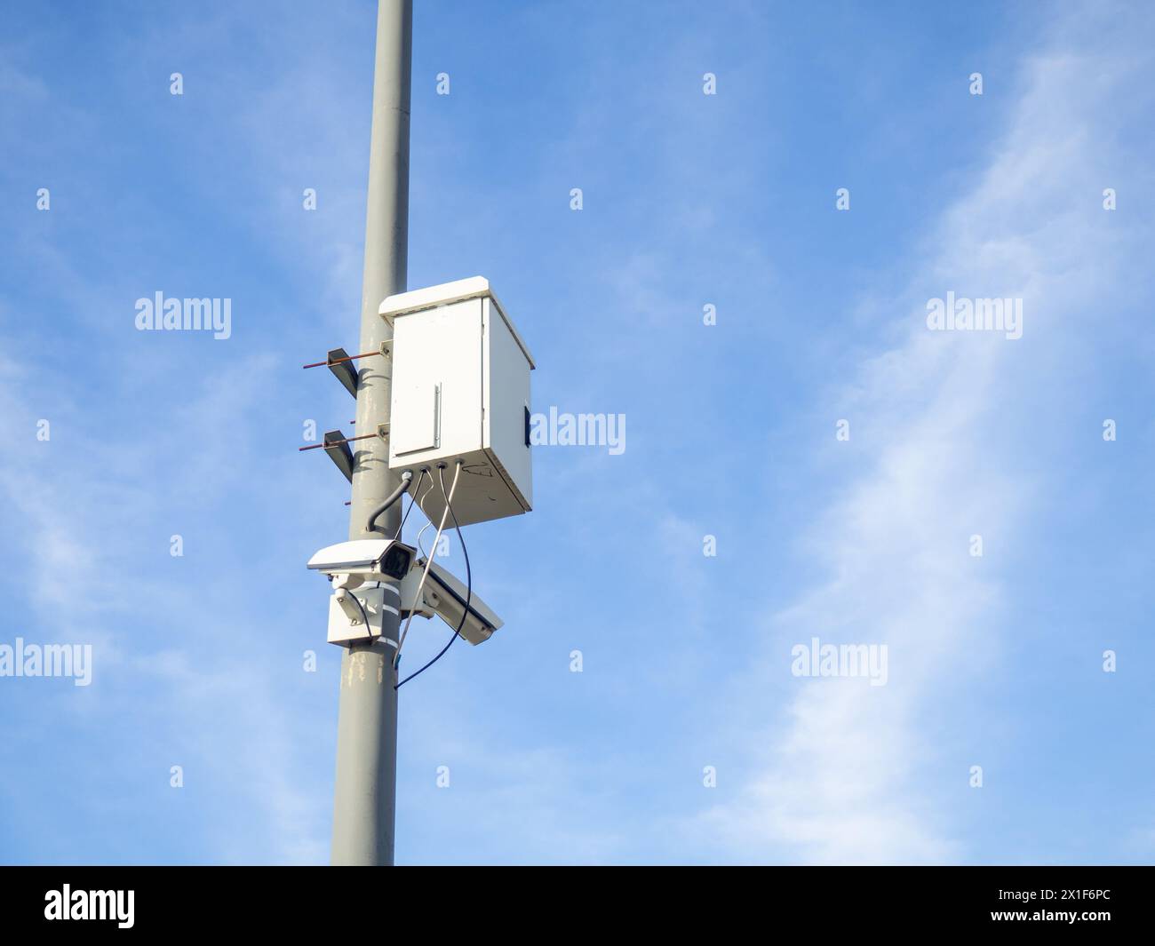 Street surveillance cameras along with a transformer. Pole observation ...