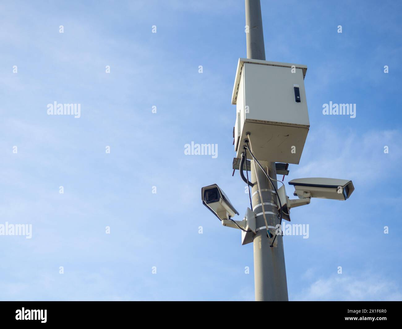Street surveillance cameras along with a transformer. Pole observation ...