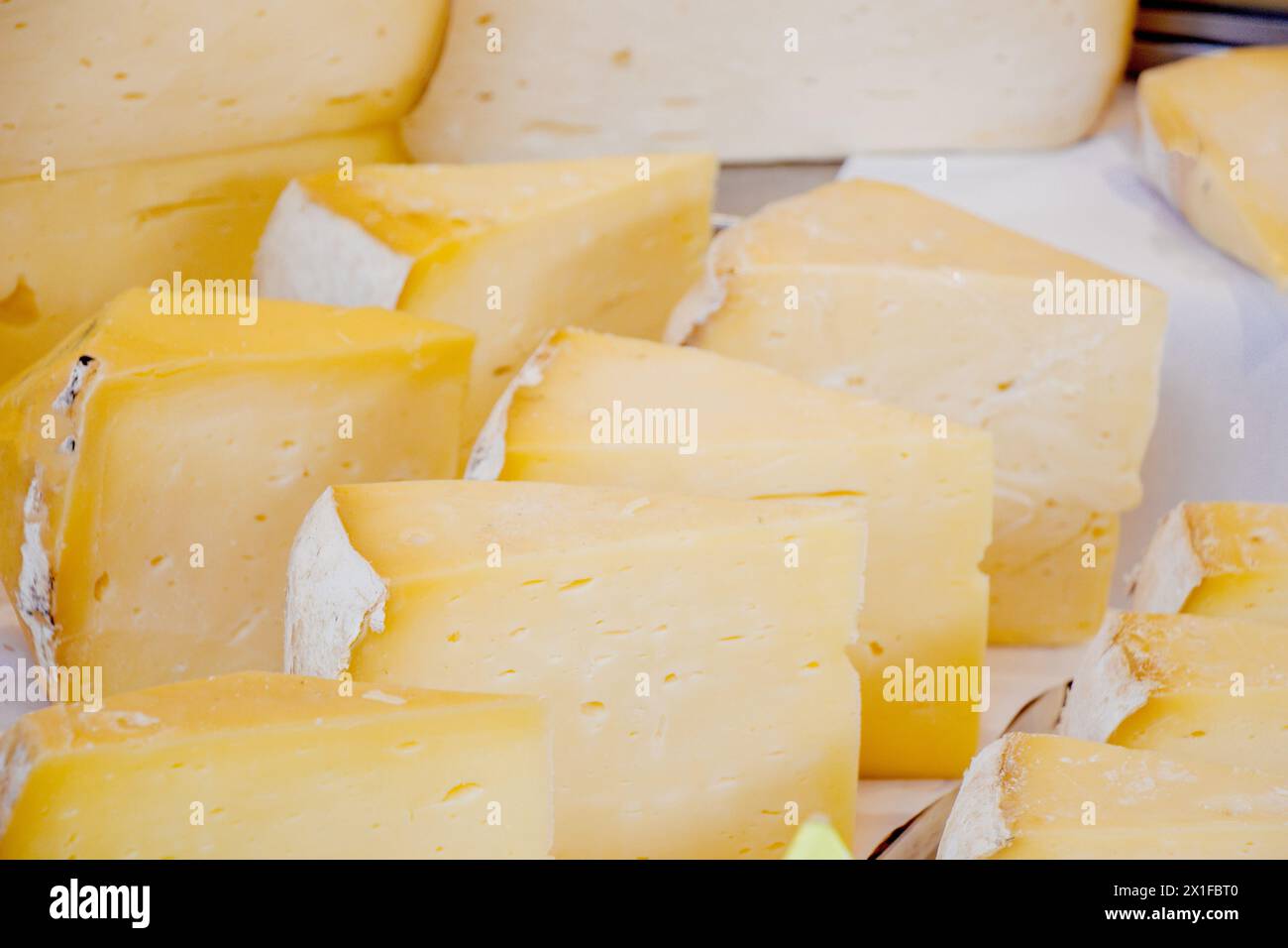 cuts of kashkaval or kasseri cheese for sale on the shelf Stock Photo ...