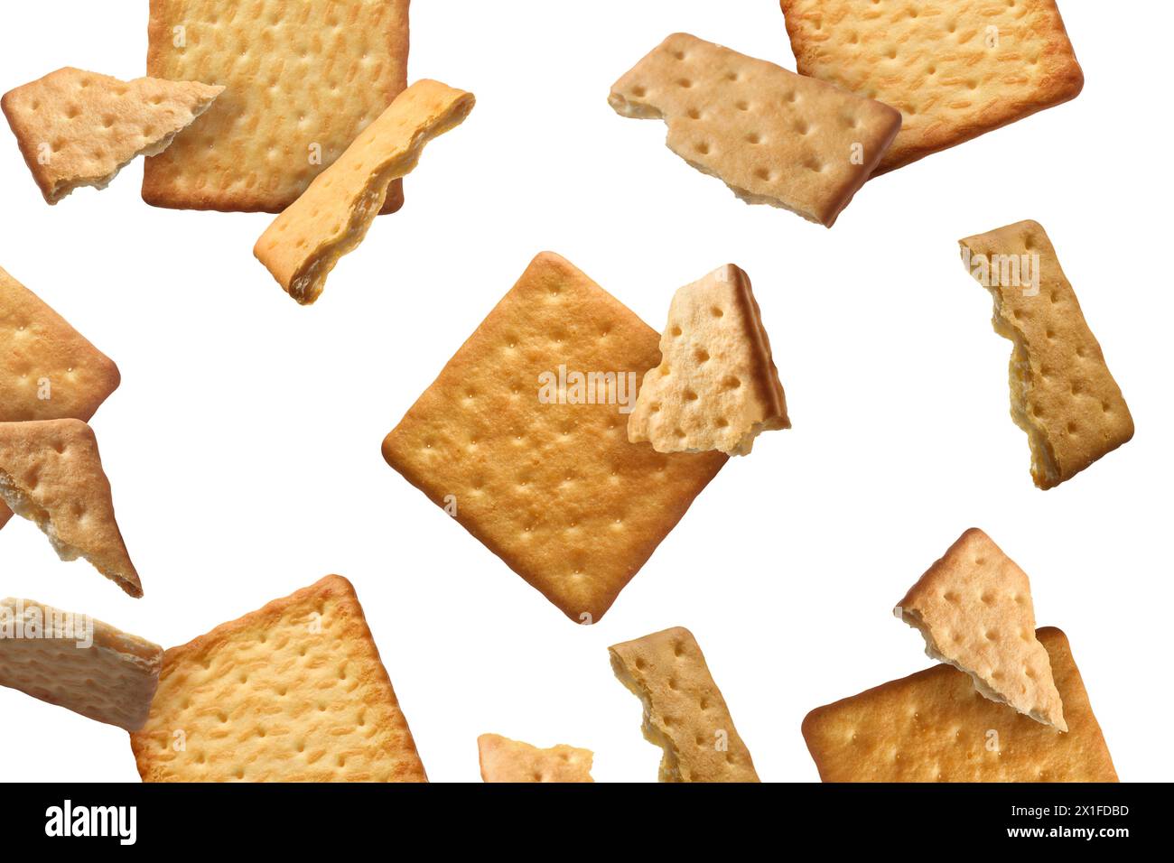 Tasty dry crackers falling on white background Stock Photo - Alamy