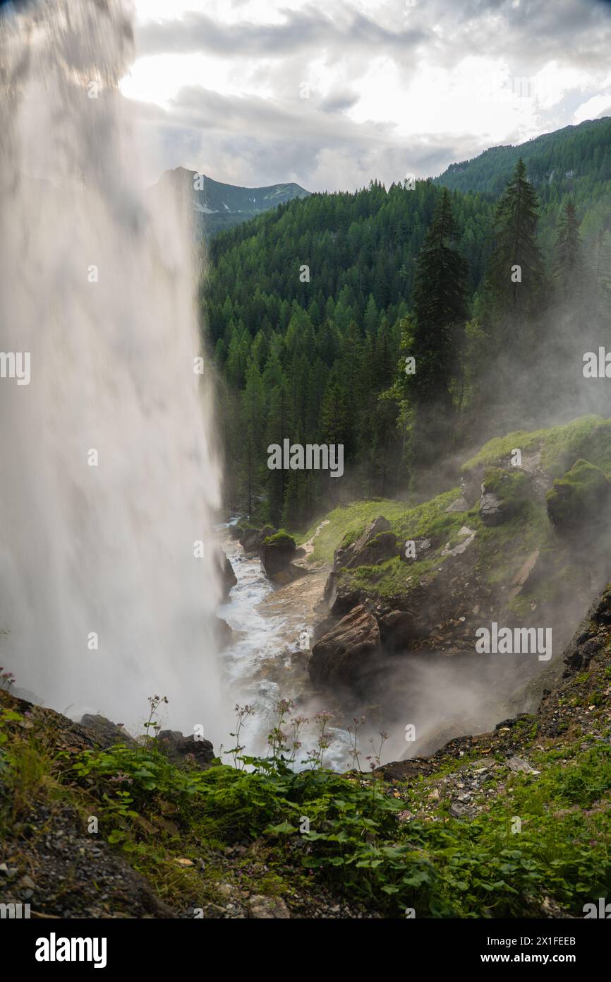 waterfall . water flow down.Streams of water crash on rocks and ...