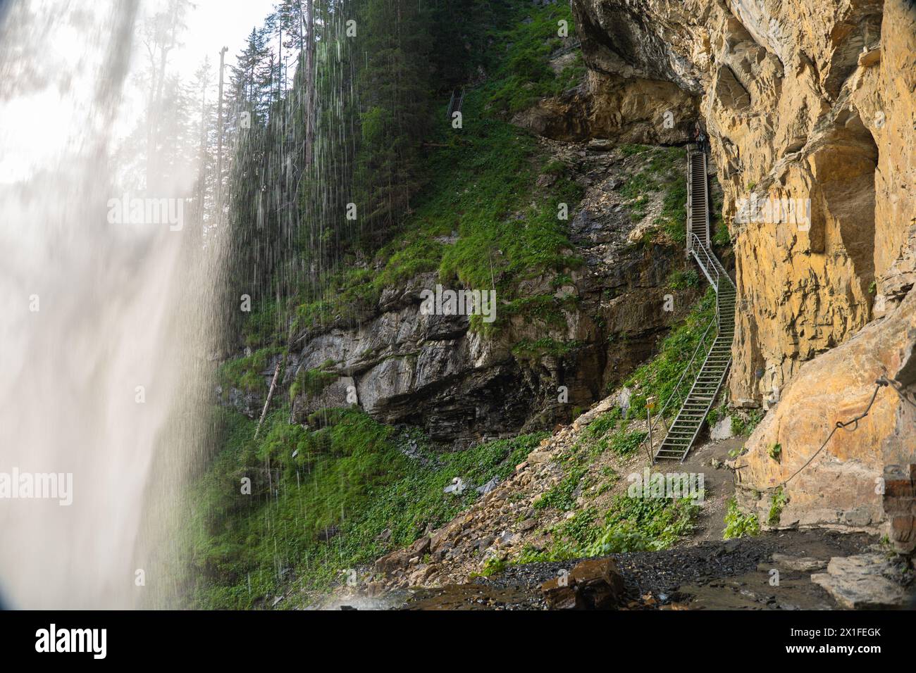 waterfall from a high cliff. water flow down.Streams of water crash on ...
