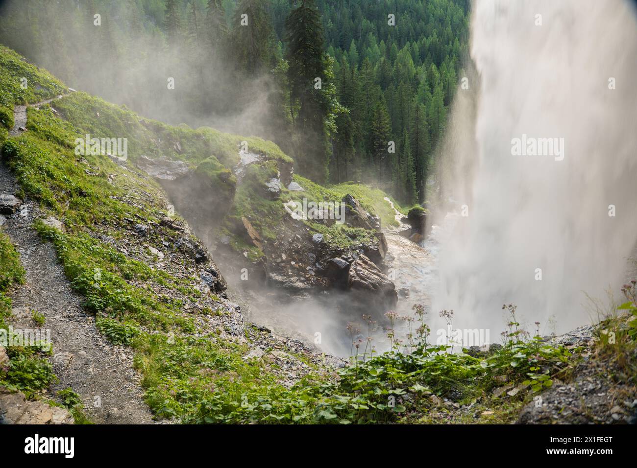 waterfall from a high cliff. water flow down.Streams of water crash on ...