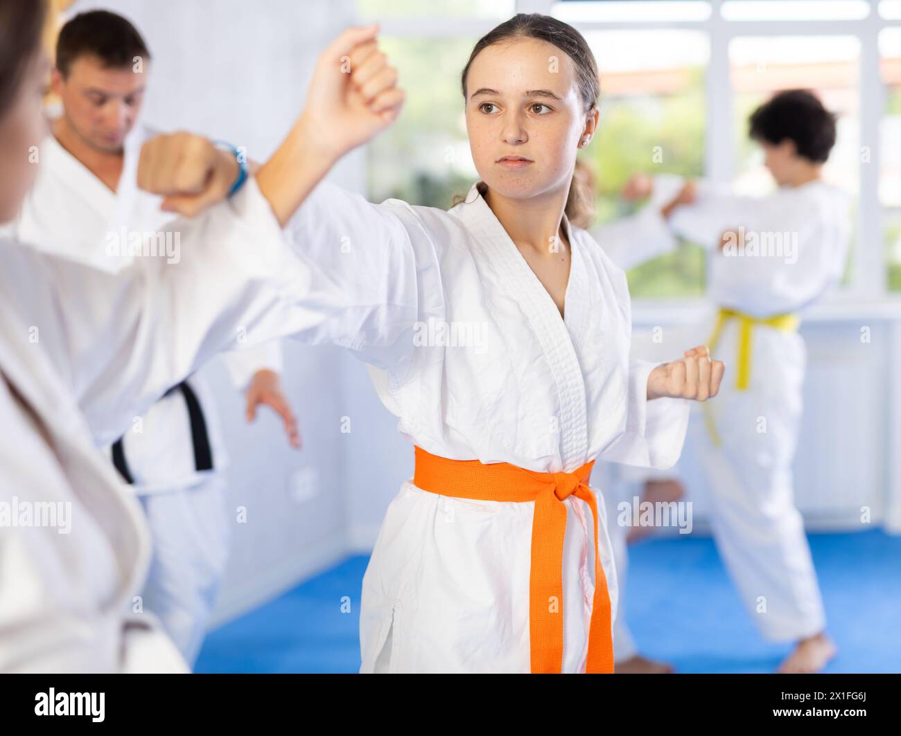 Young pupils train to perform defensive karate installations and ...