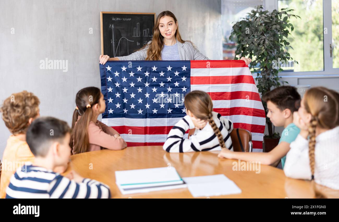 American school children teacher flag hi-res stock photography and ...