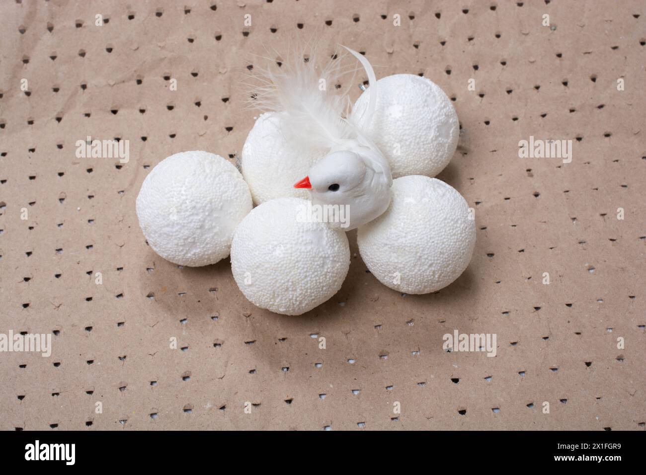 Fake feather bird for decoration on paper Stock Photo - Alamy