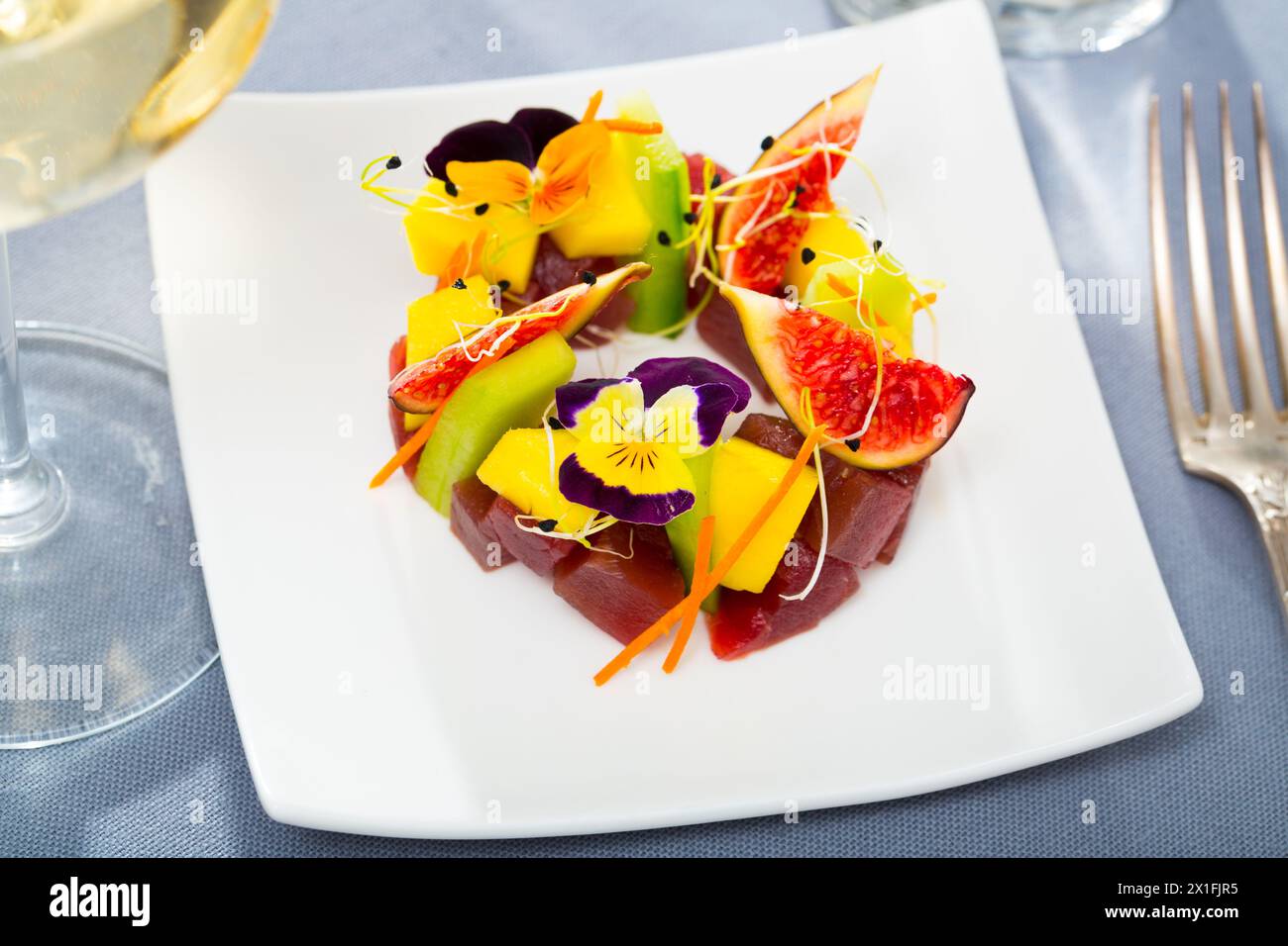Tuna tartare with figs, cucumber Stock Photo - Alamy