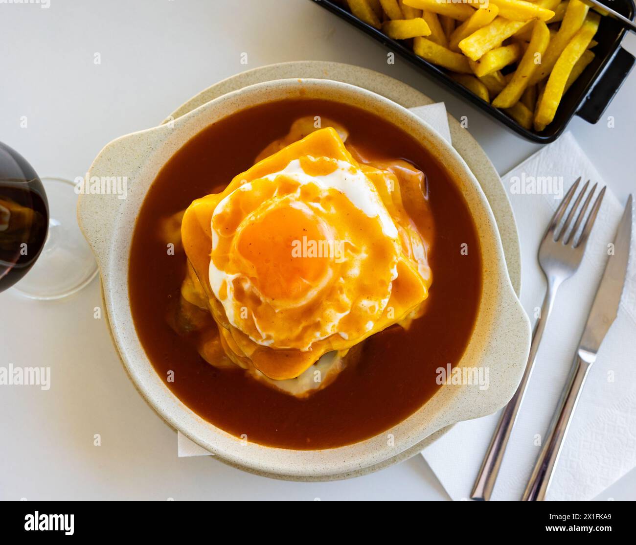 Francesinha, popular Portuguese sandwich with beer sauce Stock Photo ...