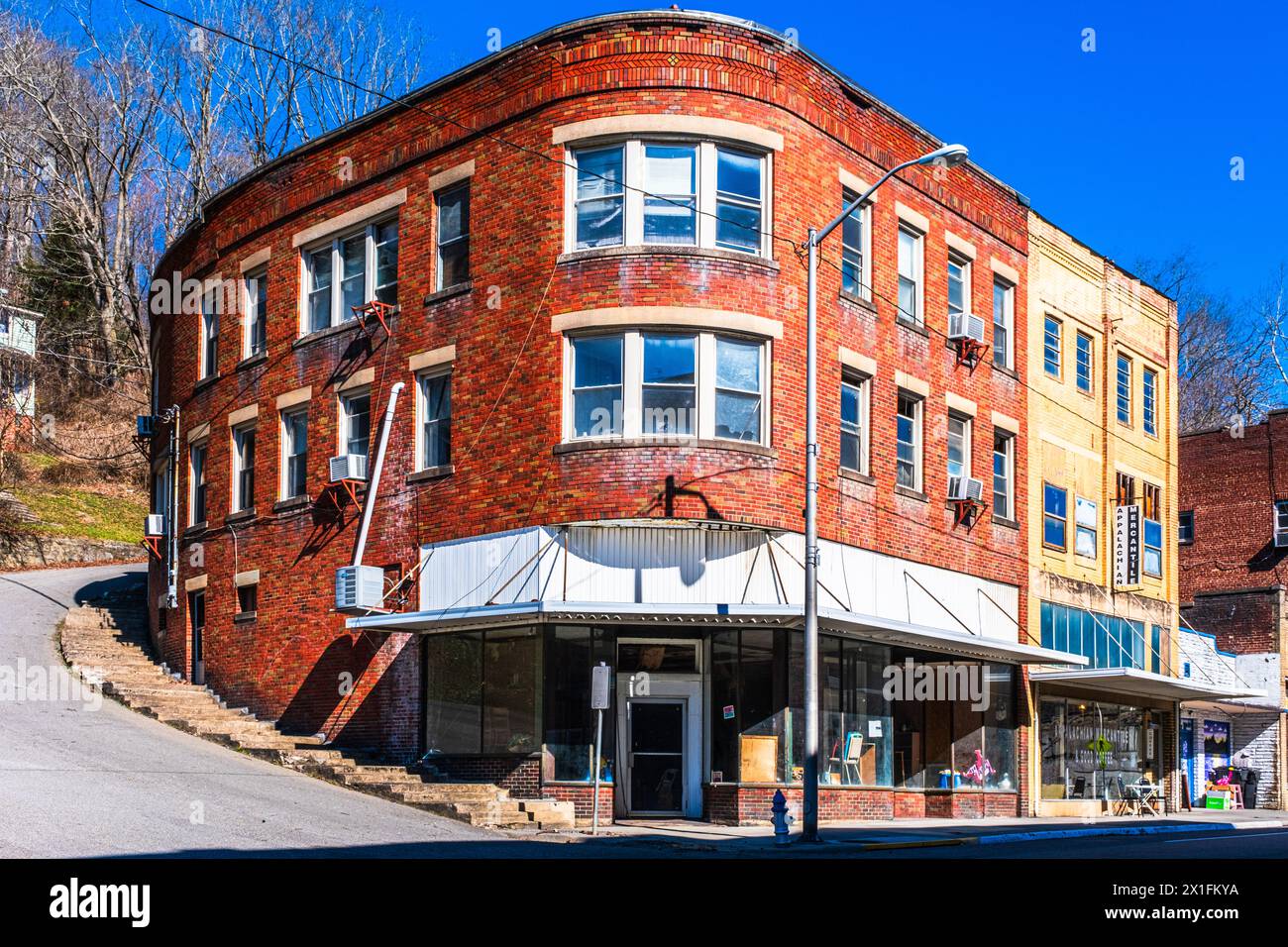 Big Stone Gap VA, USA-February 19, 2024: Curved brick commercial ...