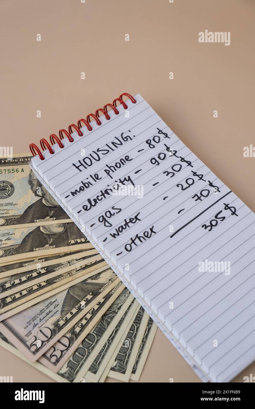 Counting receipt for utilities payment. Dollars cash money Electricity ...