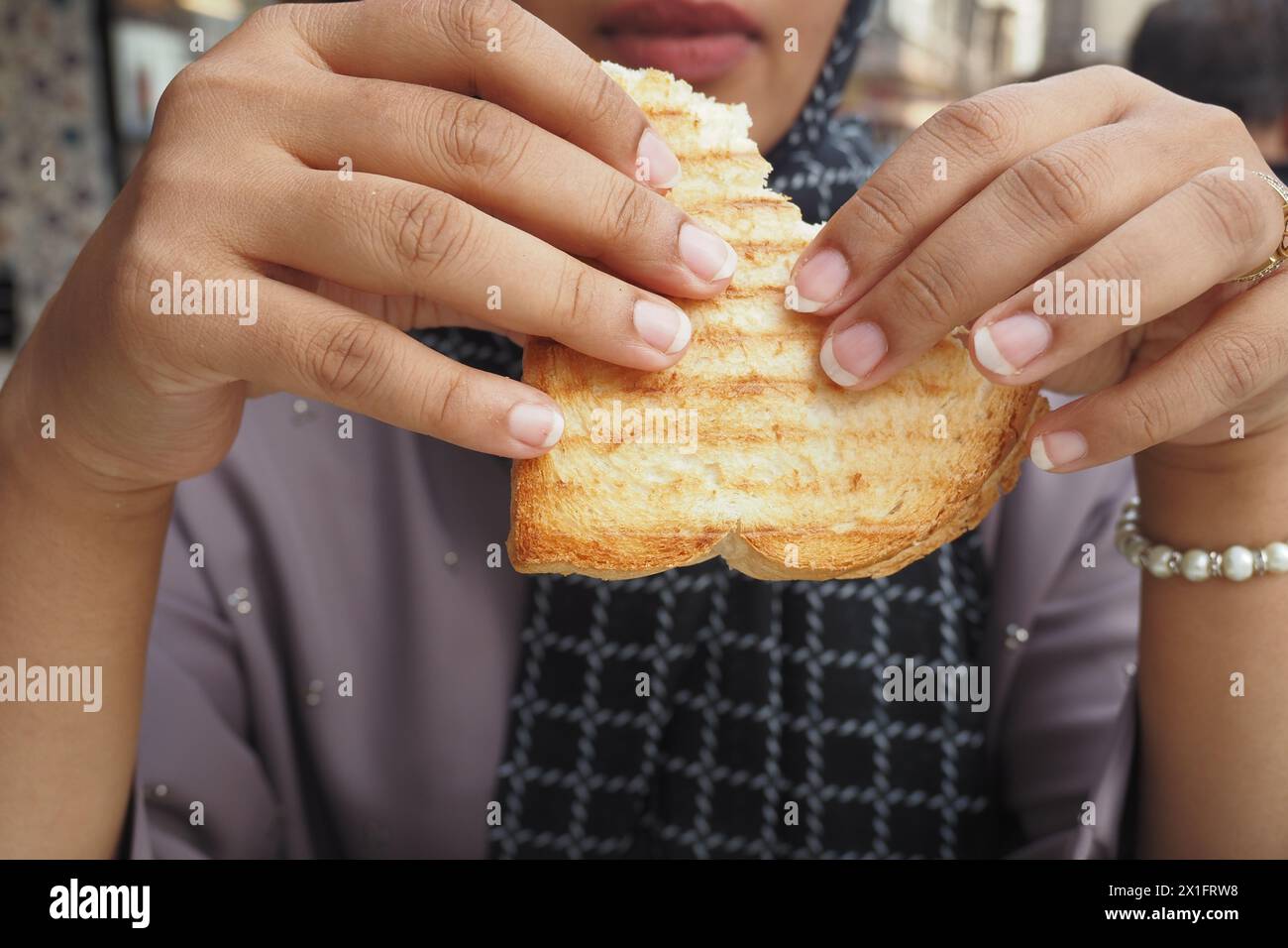 woman hand pick Sandwich with ham, cheese, tomatoes Stock Photo - Alamy