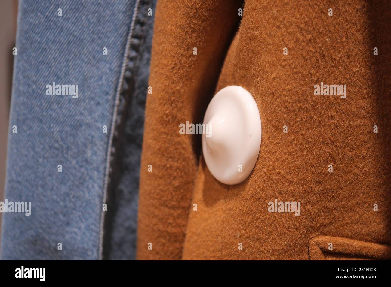 Security tags on clothes hi-res stock photography and images - Alamy