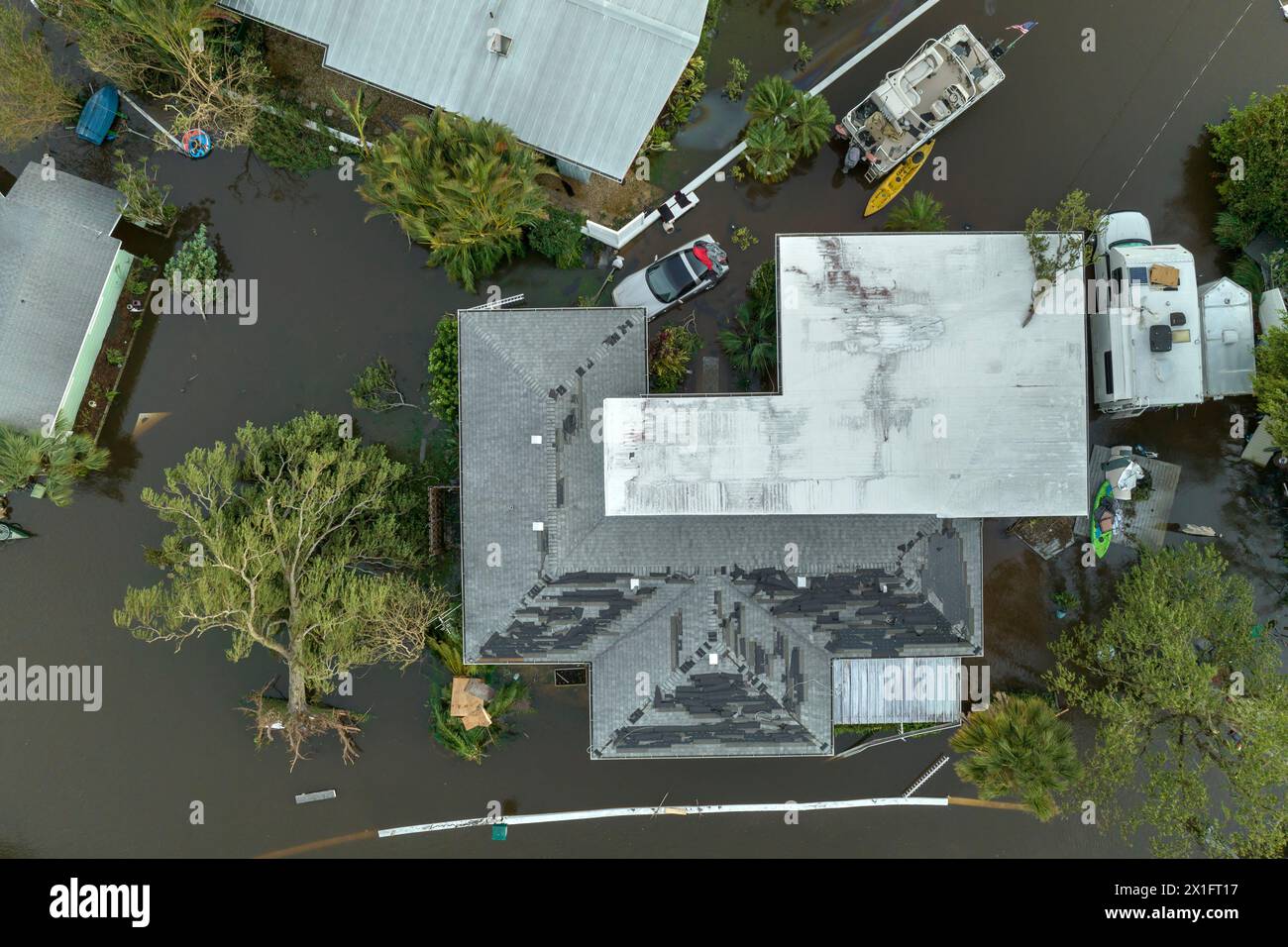 Aftermath of natural disaster. Surrounded by hurricane Ian rainfall ...