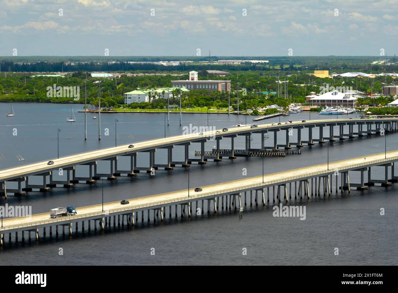 Barron Collier Bridge and Gilchrist Bridge in Florida with moving ...