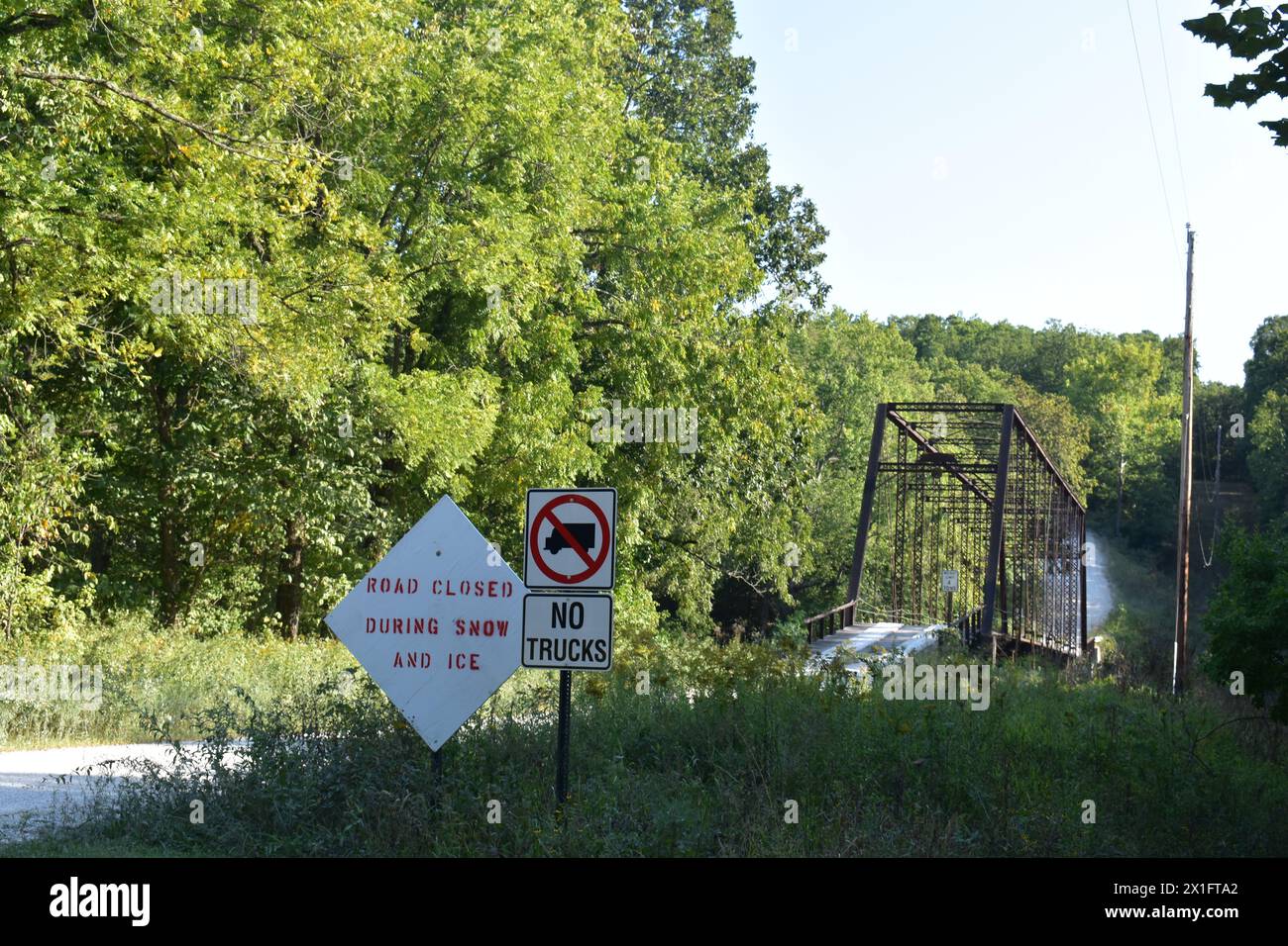 Bridge with caution sign hi-res stock photography and images - Alamy