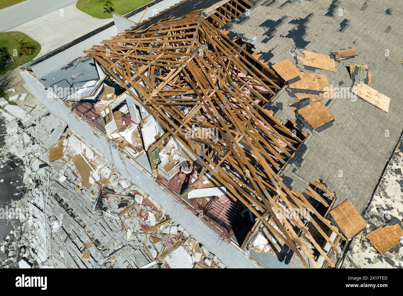 Damaged house roof and walls after hurricane Ian in Florida ...