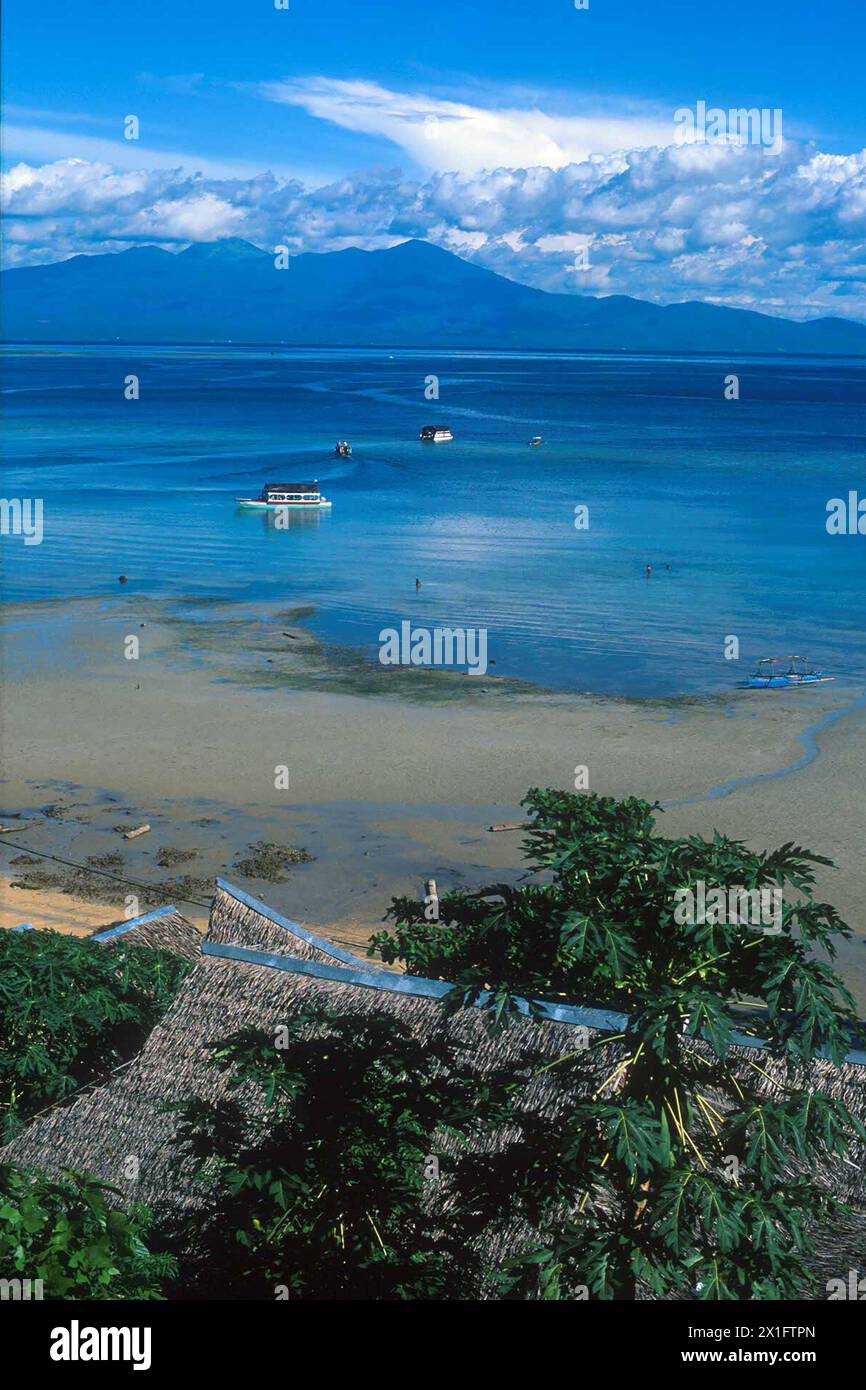 View of beach and mainland, taken in 1995, Bunaken Island; near Manado ...