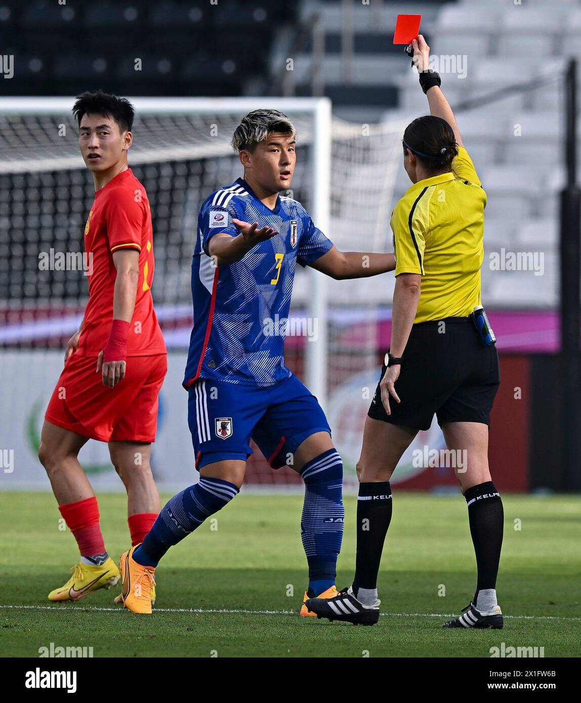 Doha, Qatar. 16th Apr, 2024. Referee Casey Reibelt (R) of Australia ...