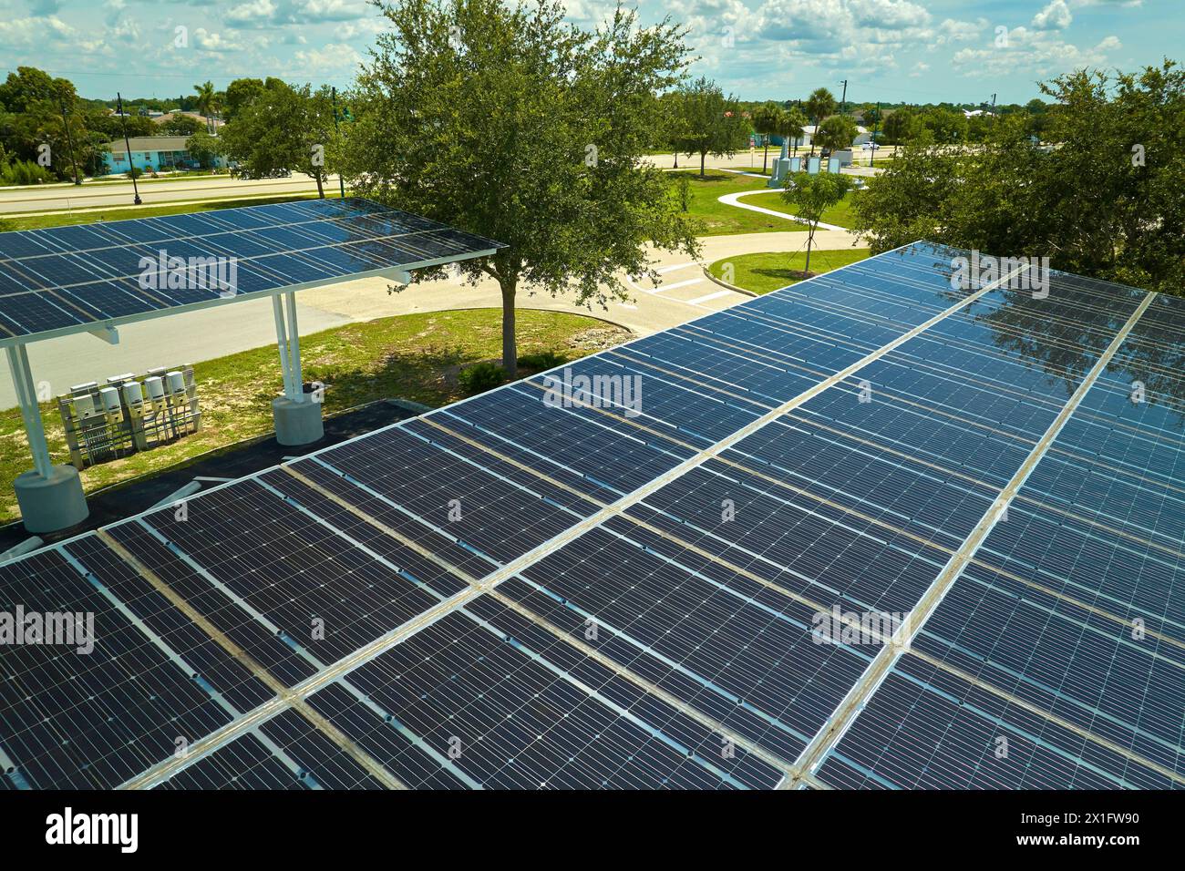 Solar panels installed over parking lot for parked cars for effective ...