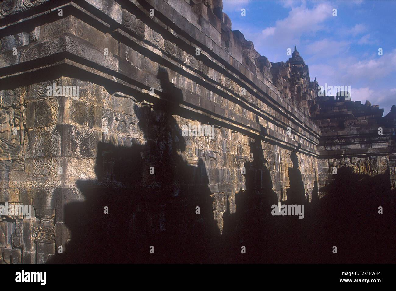 Kamadhatu relief with shadow of bell-shaped stupas, Borobudur Temple ...