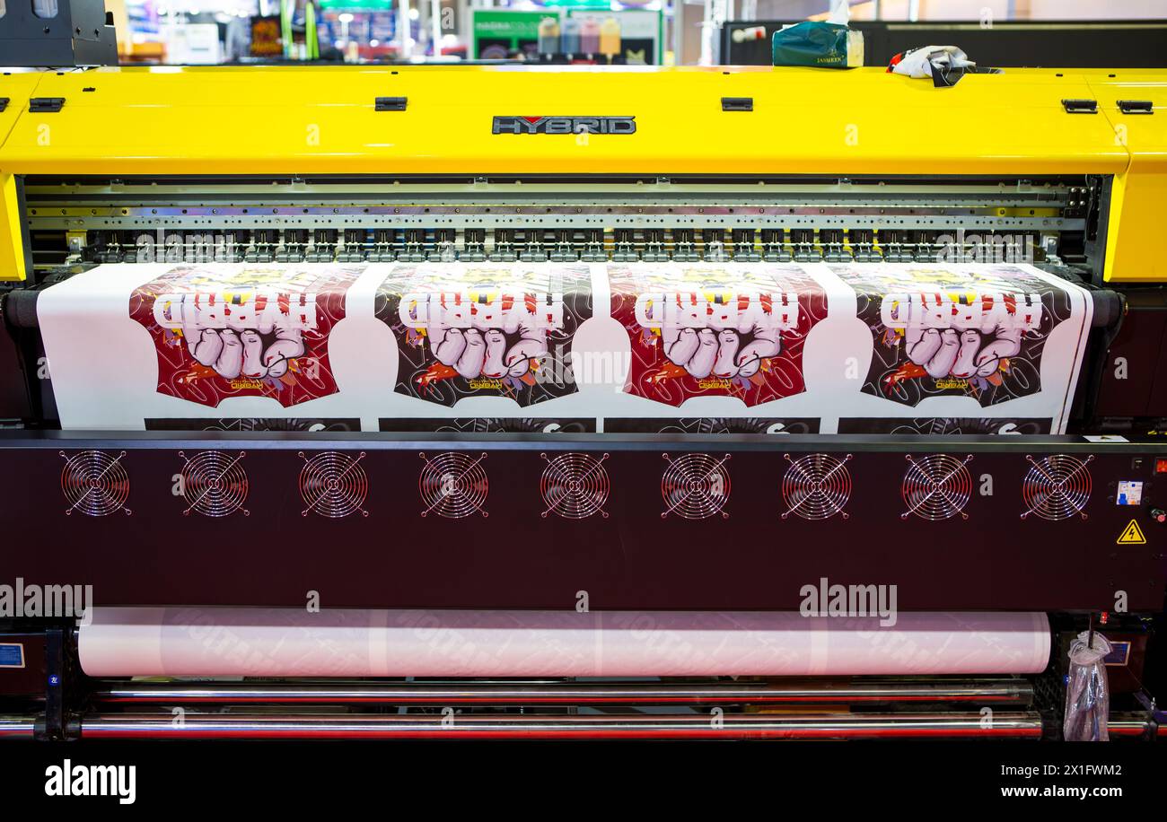 Sublimation printer printing T shirt Stock Photo - Alamy